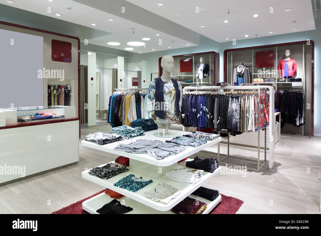 luxury and fashionable brand new interior of cloth store Stock Photo ...
