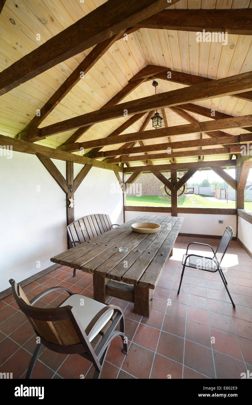 cozy light veranda in modern wooden house Stock Photo - Alamy
