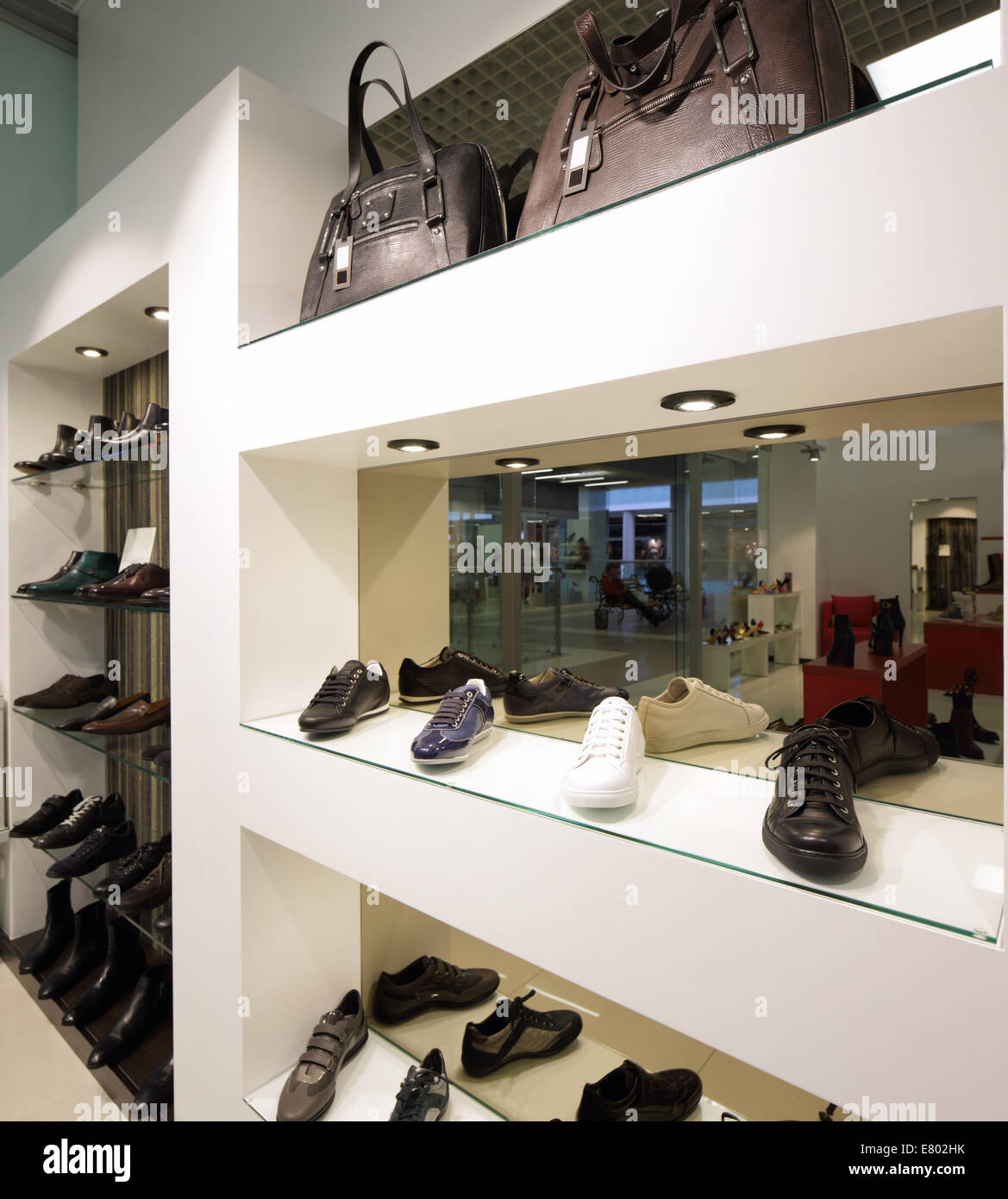 bright and fashionable interior of shoe store in modern mall Stock ...