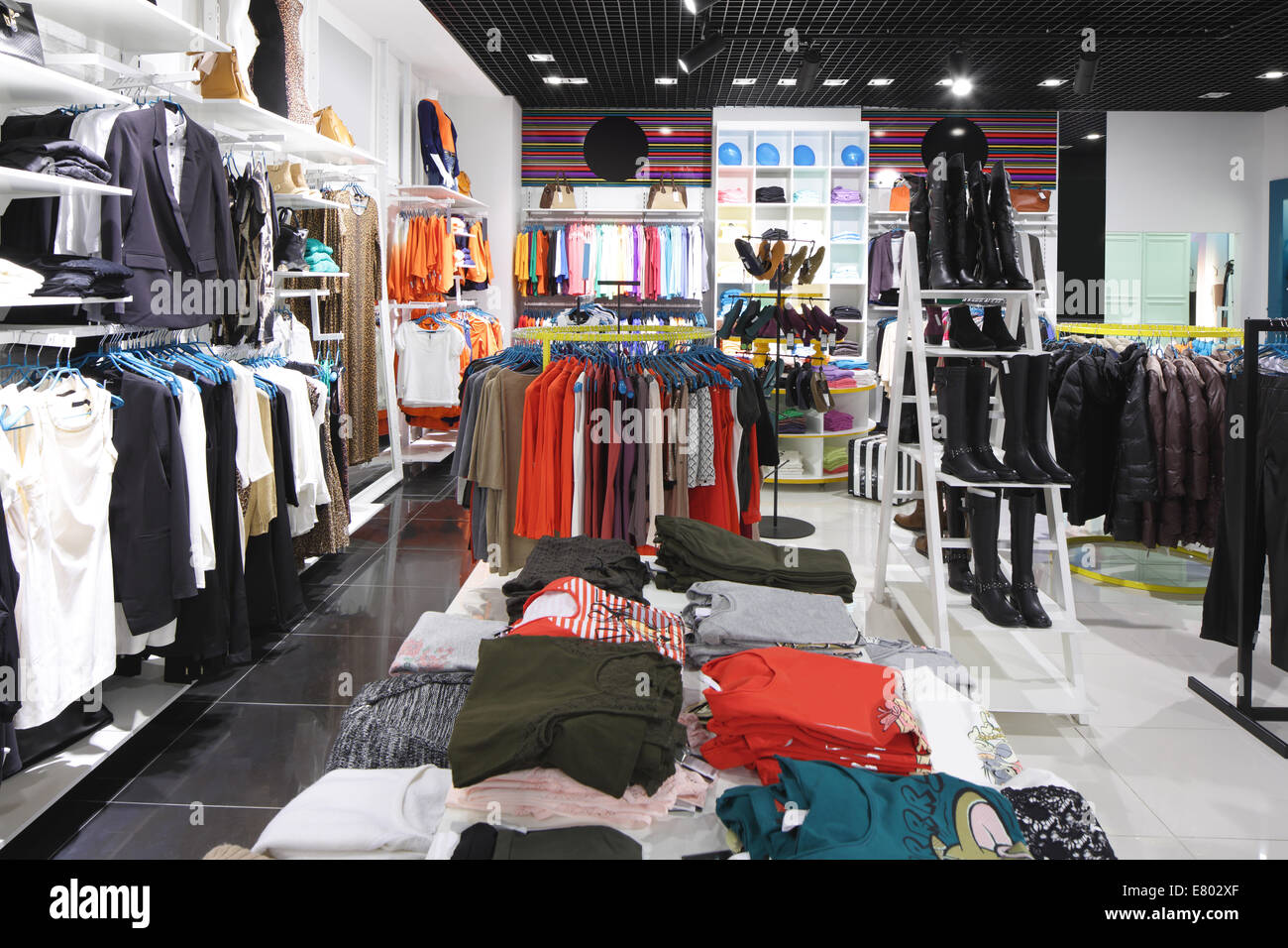 luxury and fashionable brand new interior of cloth store Stock Photo ...