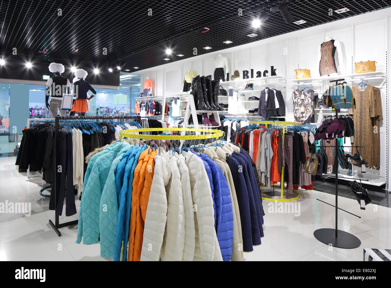 luxury and fashionable brand new interior of cloth store Stock Photo ...