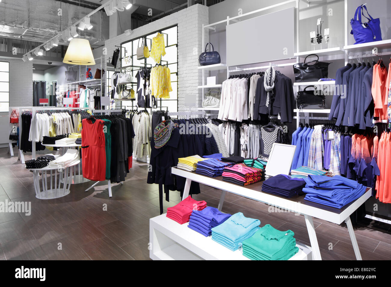 luxury and fashionable brand new interior of cloth store Stock Photo ...
