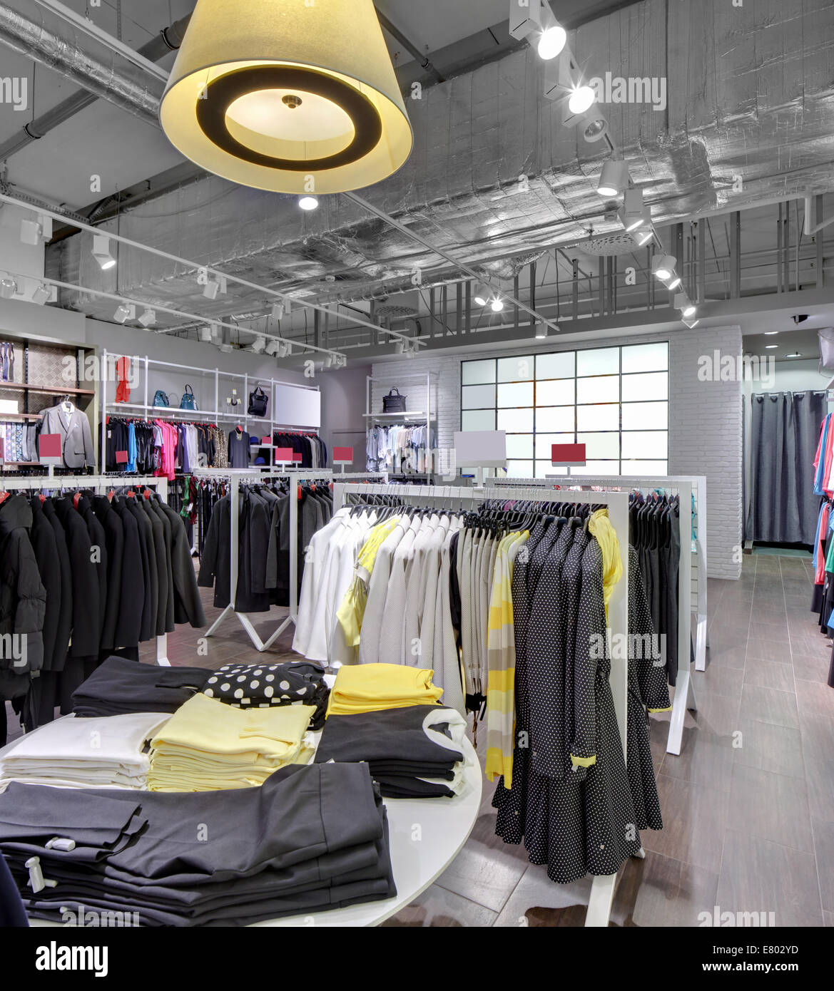 luxury and fashionable brand new interior of cloth store Stock Photo ...