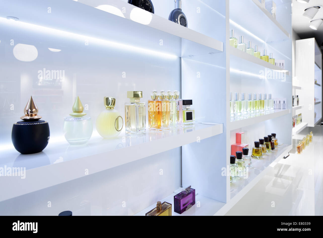 light and stylish luxury perfume store with famous fragance Stock Photo ...