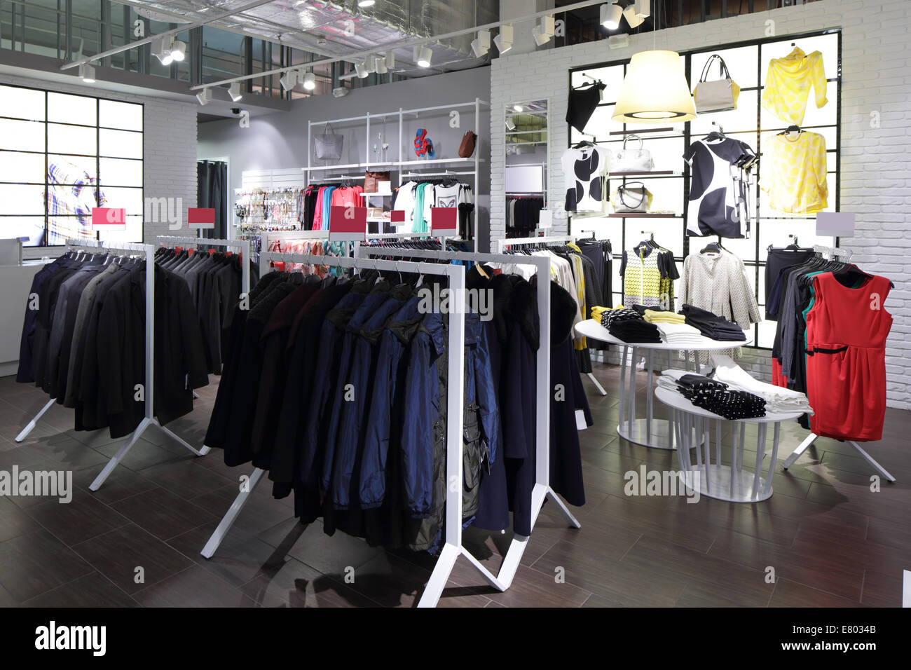 luxury and fashionable brand new interior of cloth store Stock Photo ...