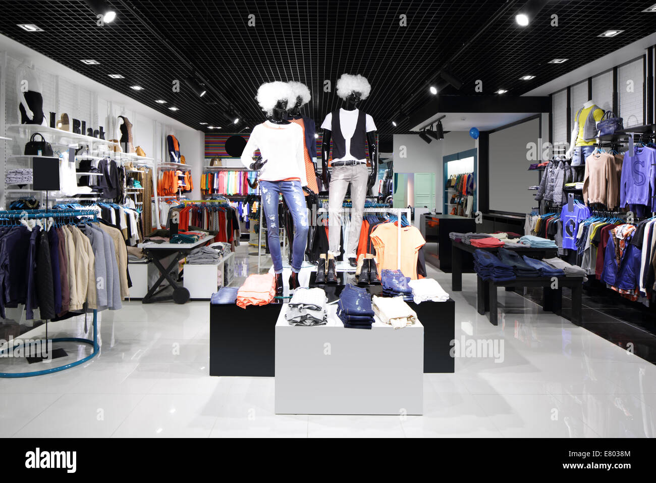 luxury and fashionable brand new interior of cloth store Stock Photo ...