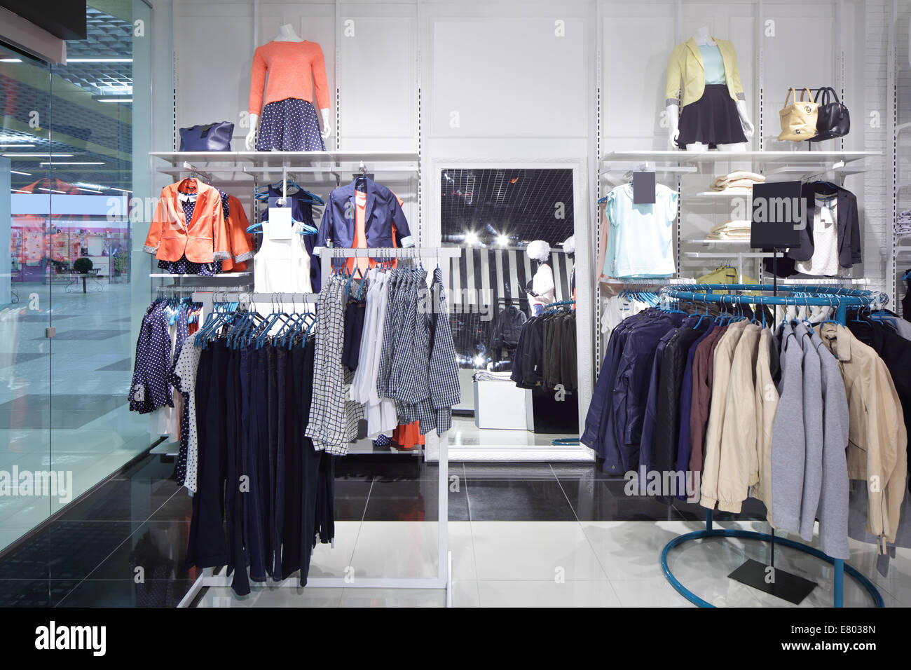 luxury and fashionable brand new interior of cloth store Stock Photo ...