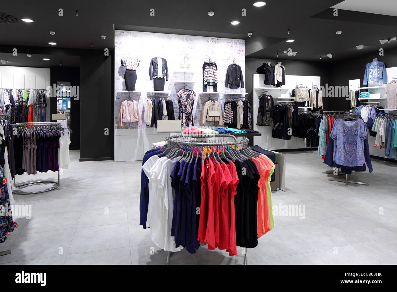 luxury and fashionable brand new interior of cloth store Stock Photo ...