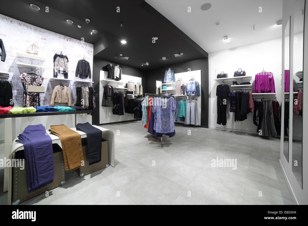 luxury and fashionable brand new interior of cloth store Stock Photo ...