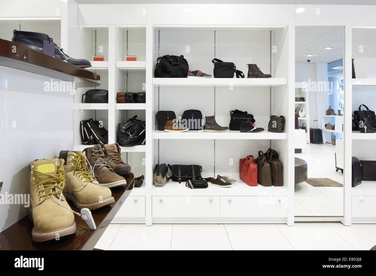 bright and fashionable interior of shoe store in modern mall Stock ...