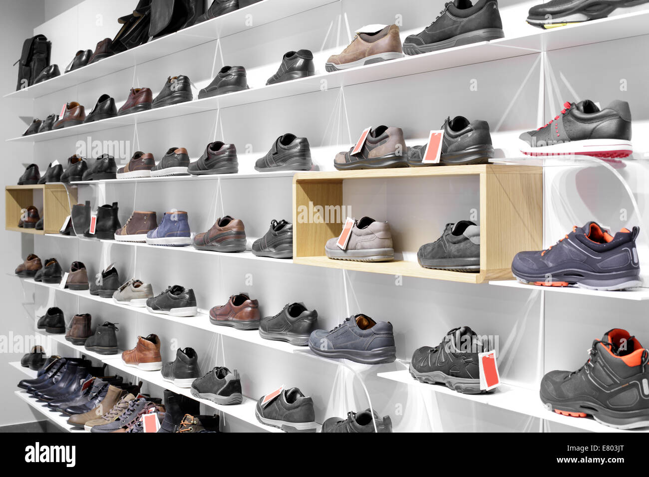 bright and fashionable interior of shoe store in modern mall Stock ...