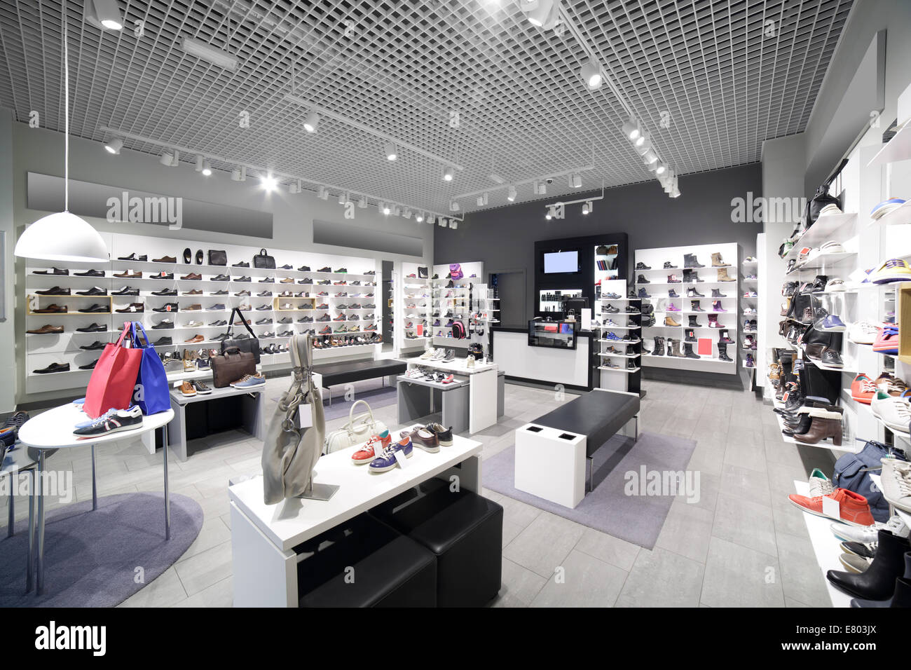 bright and fashionable interior of shoe store in modern mall Stock ...