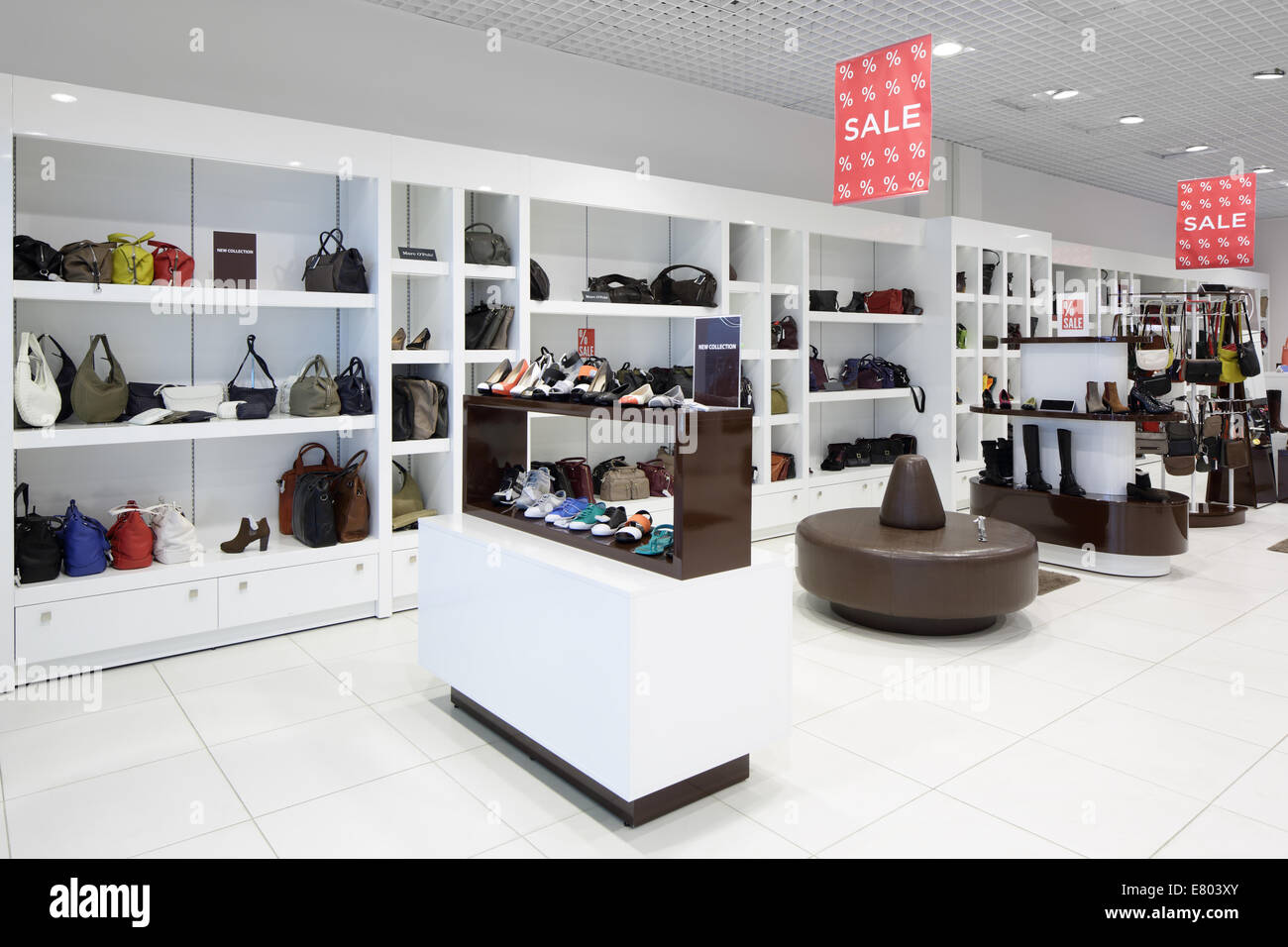 bright and fashionable interior of shoe store in modern mall Stock ...
