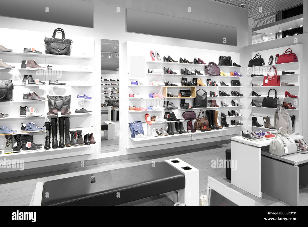 bright and fashionable interior of shoe store in modern mall Stock ...