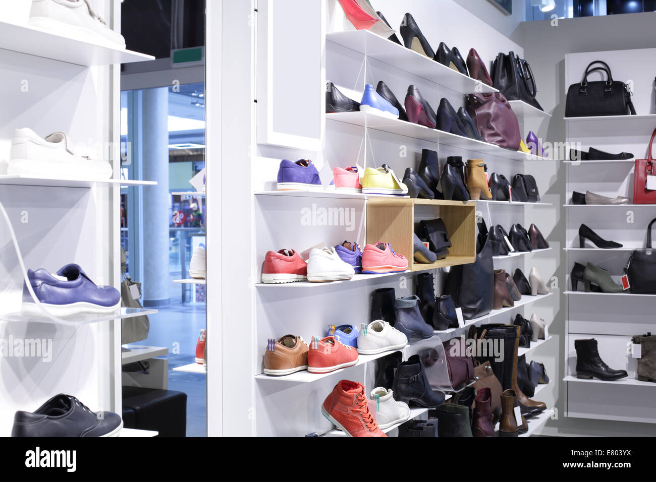 bright and fashionable interior of shoe store in modern mall Stock ...