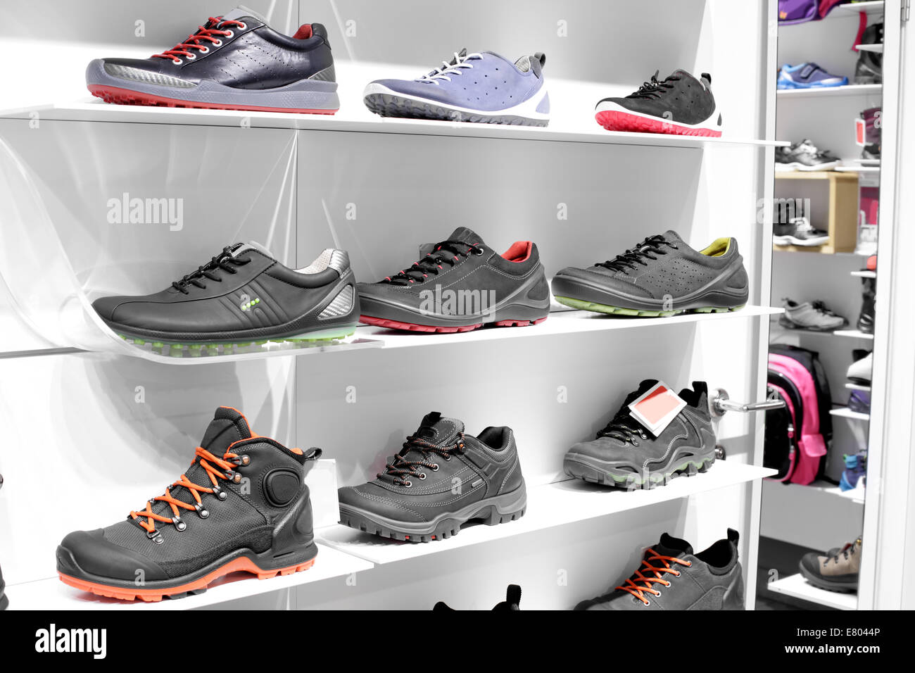 bright and fashionable interior of shoe store in modern mall Stock ...