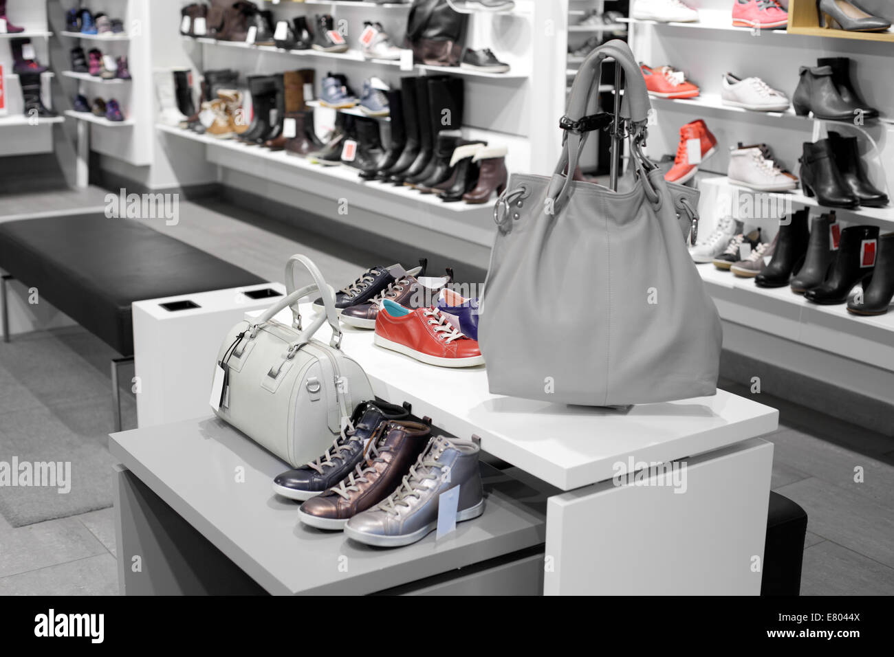 bright and fashionable interior of shoe store in modern mall Stock ...