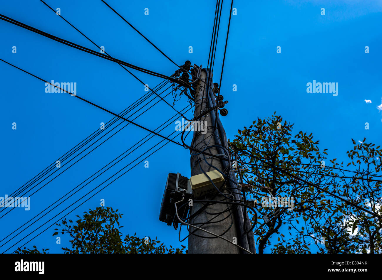 Electric pole and cables Stock Photo - Alamy