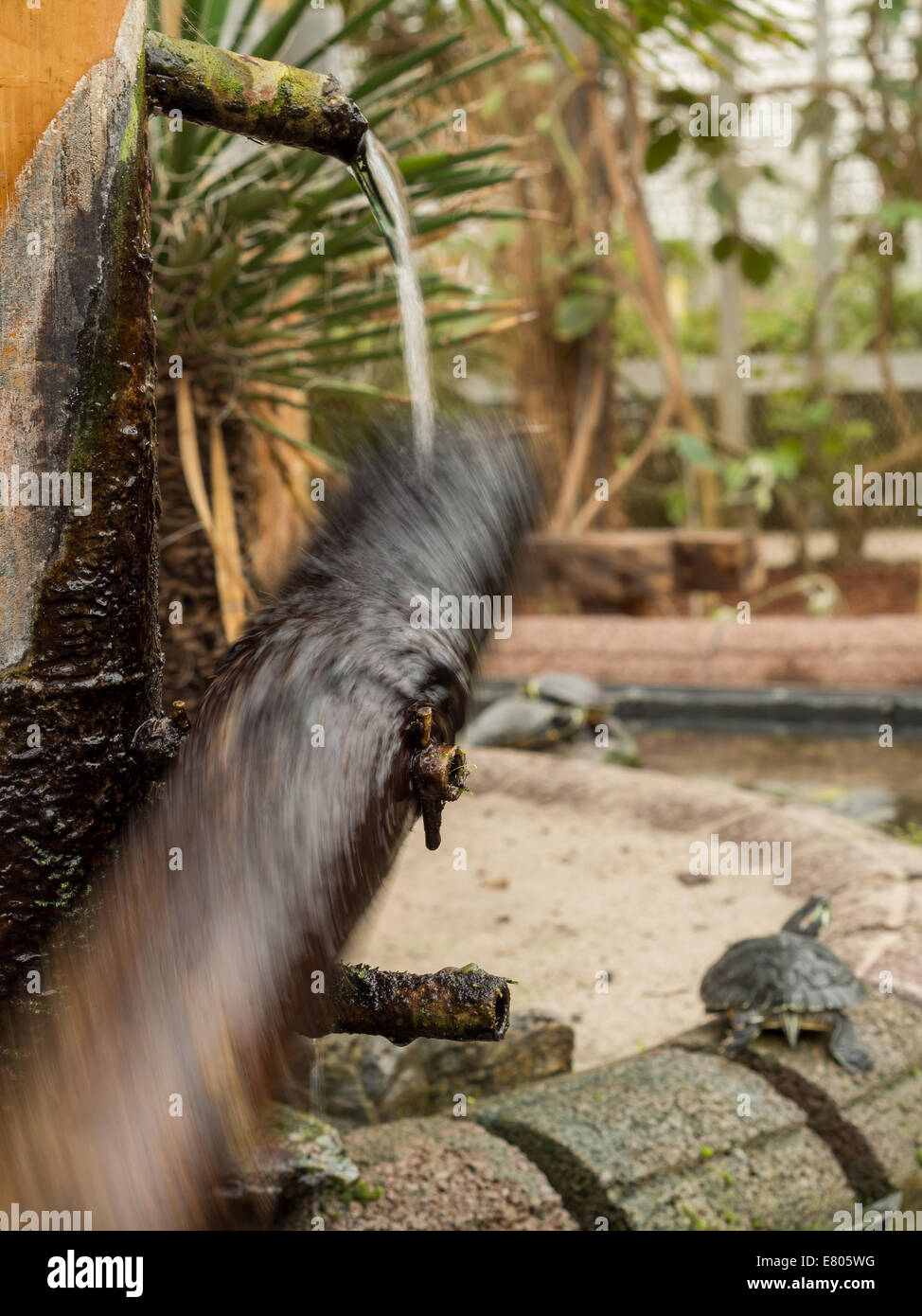 Water wheel caught in motion while spinning Stock Photo - Alamy