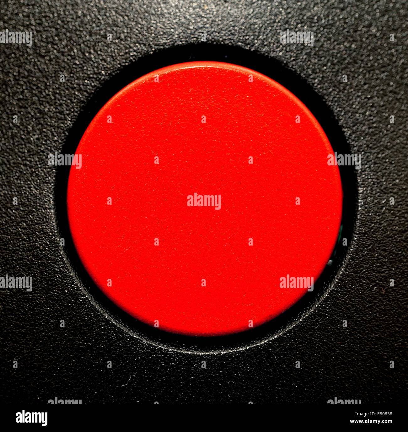 A blank red button with a black plastic surround Stock Photo - Alamy