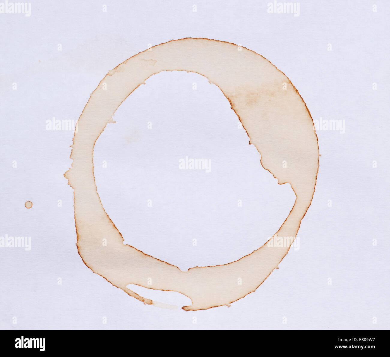 coffee ring stains on white paper background Stock Photo - Alamy