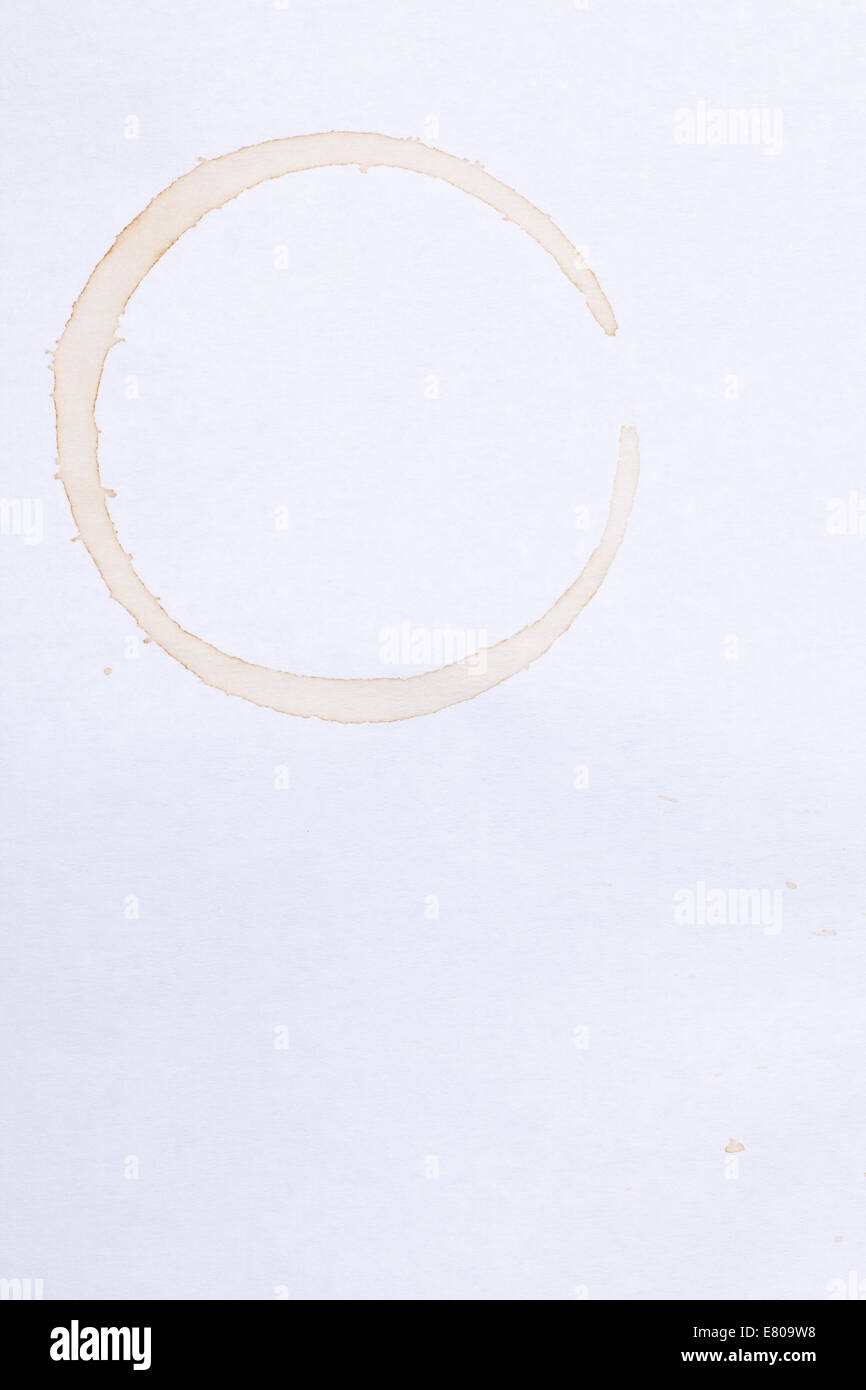 coffee ring stains on white paper background Stock Photo - Alamy