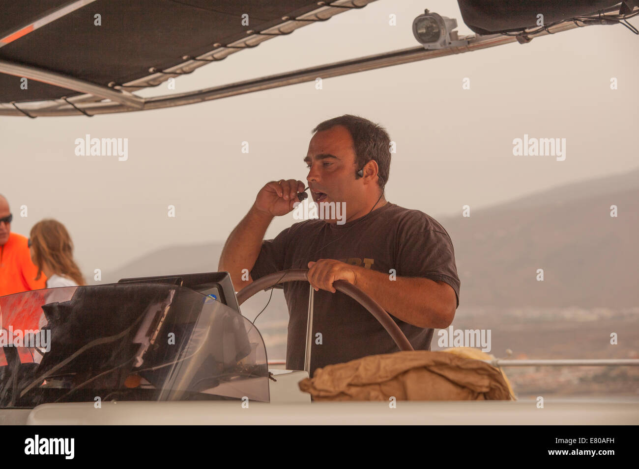 Tour boat captain giving talk Stock Photo - Alamy