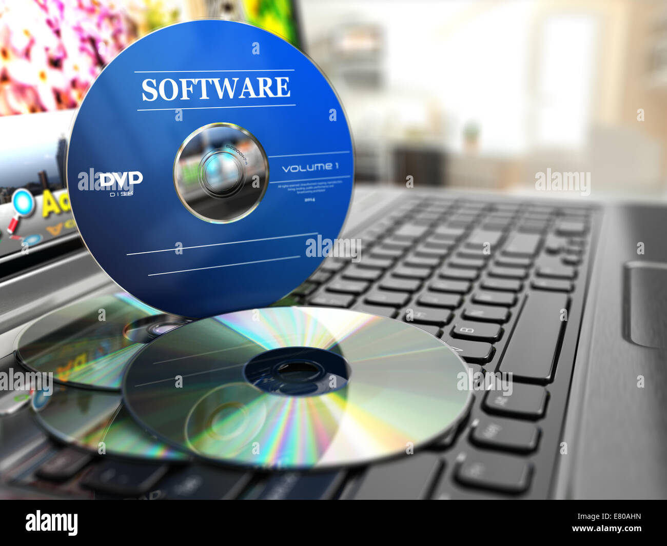 Software CD on laptop keyboard. Compact disks. 3d Stock Photo - Alamy