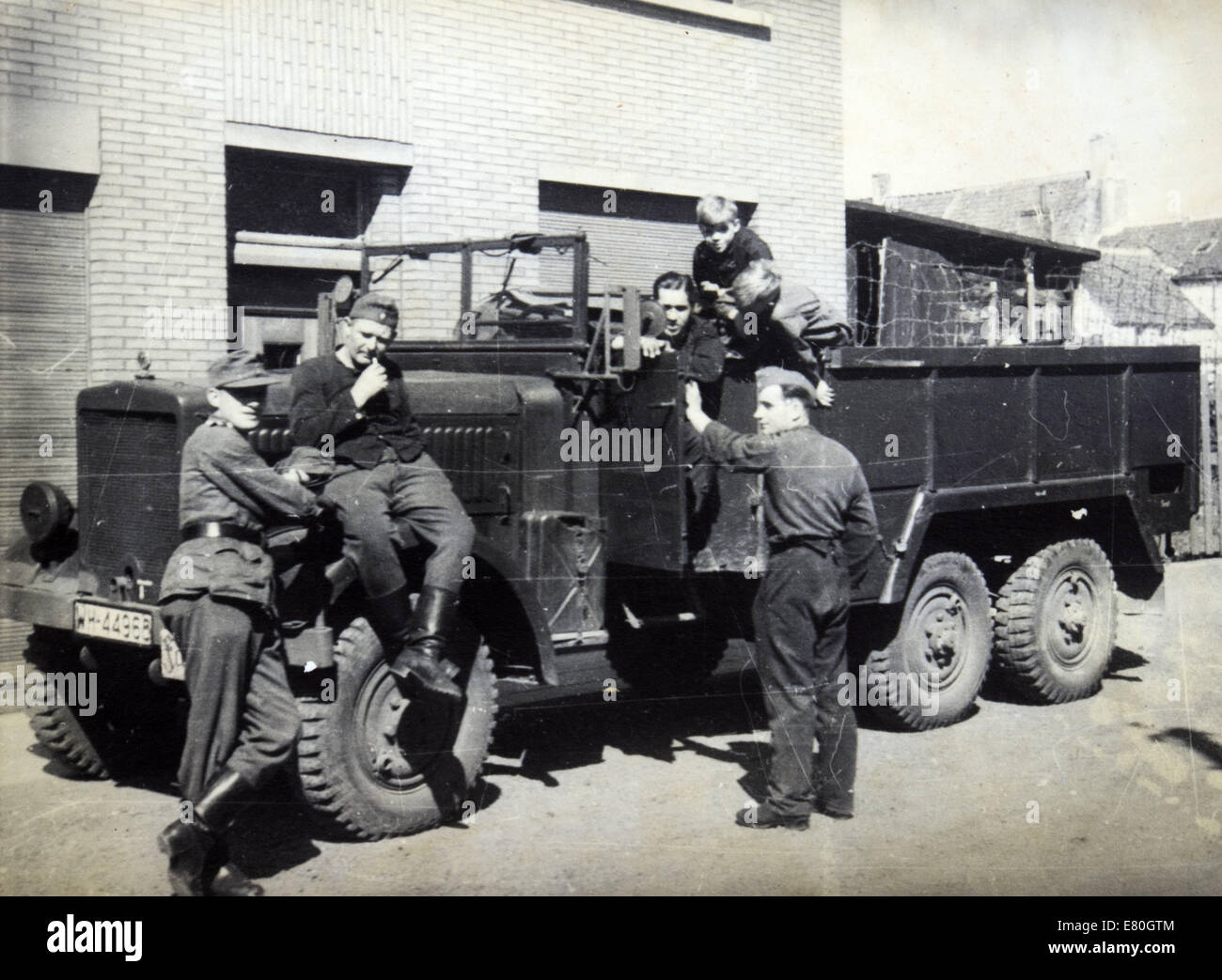 Group of German soldiers posing on the military truck, Germany, 1940s ...