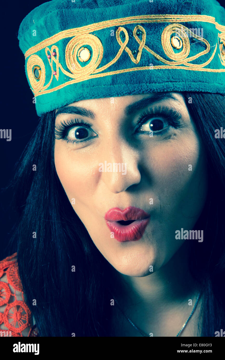 Woman wearing traditional middle eastern hat Stock Photo - Alamy