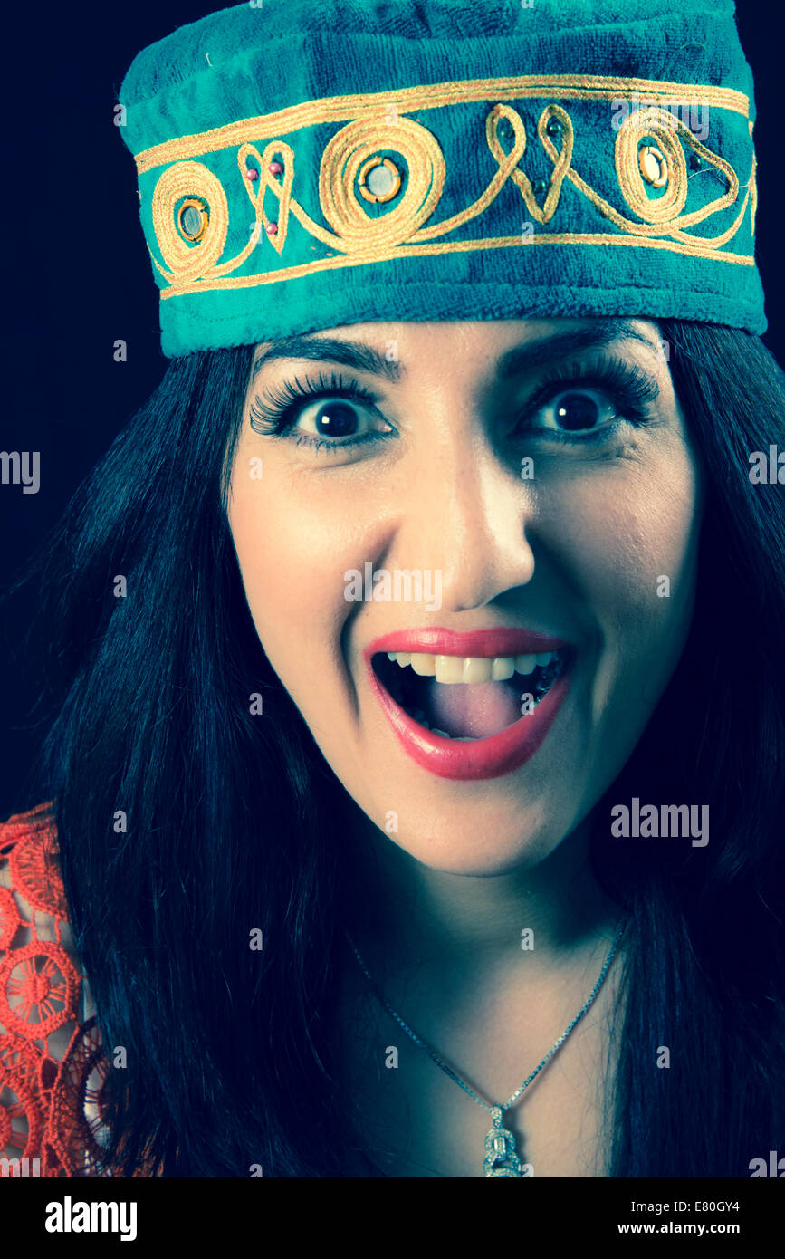 Woman wearing traditional middle eastern hat Stock Photo - Alamy