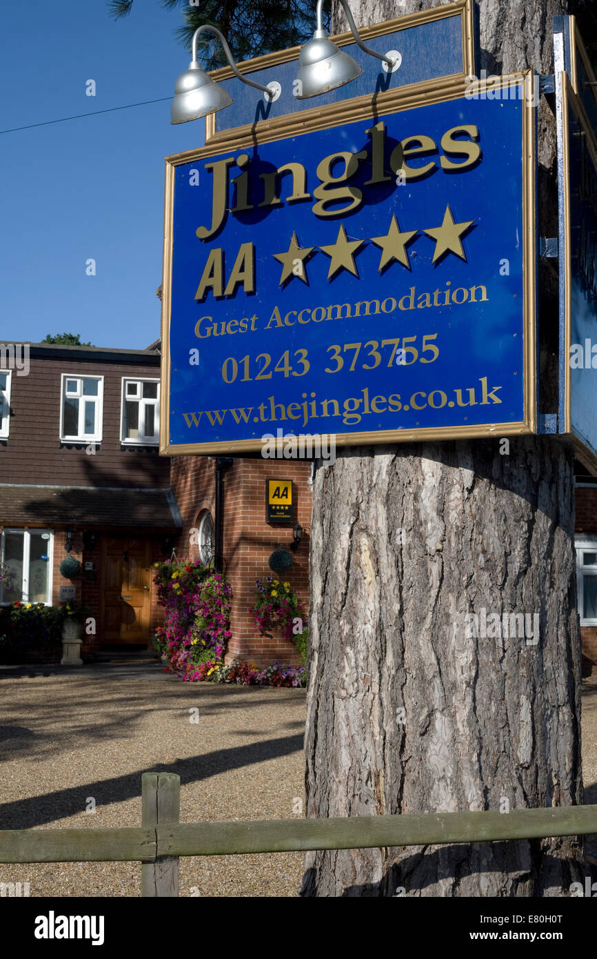 sign at entrance to Jingles hotel of guest accommodation, a bed and ...