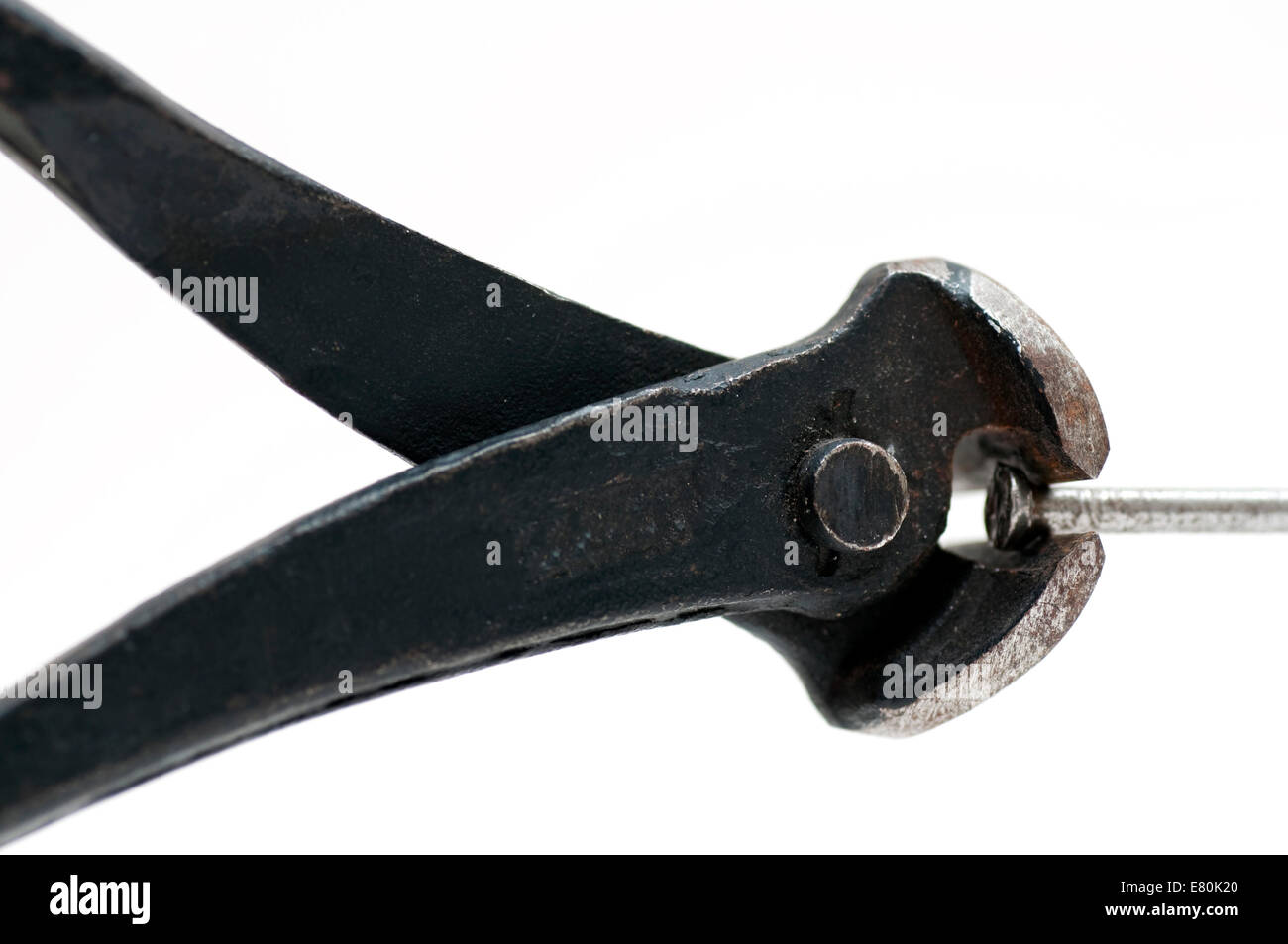 Pliers pulling of a nail Stock Photo - Alamy