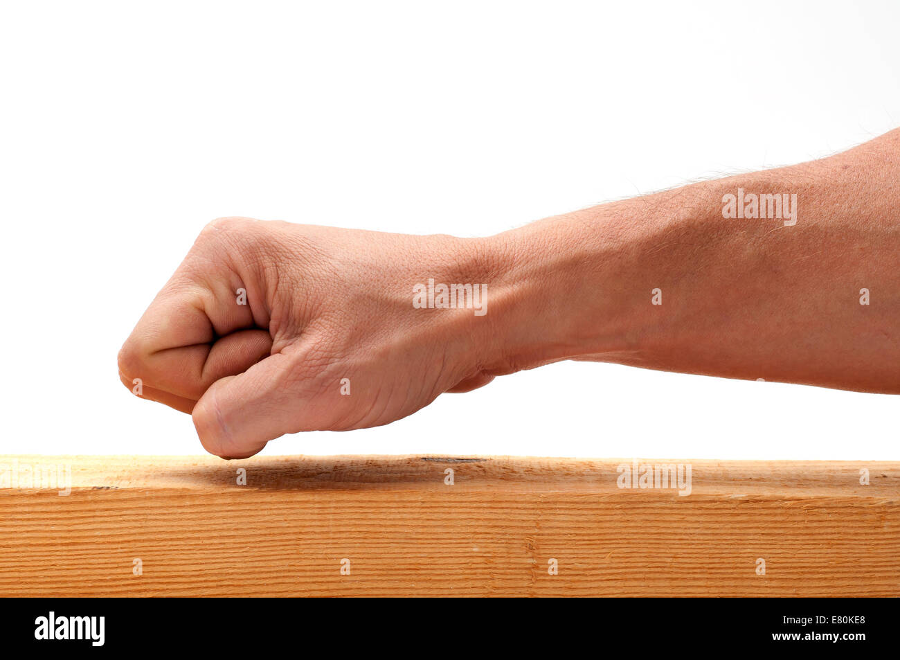 Knock Knocking on wood Stock Photo - Alamy