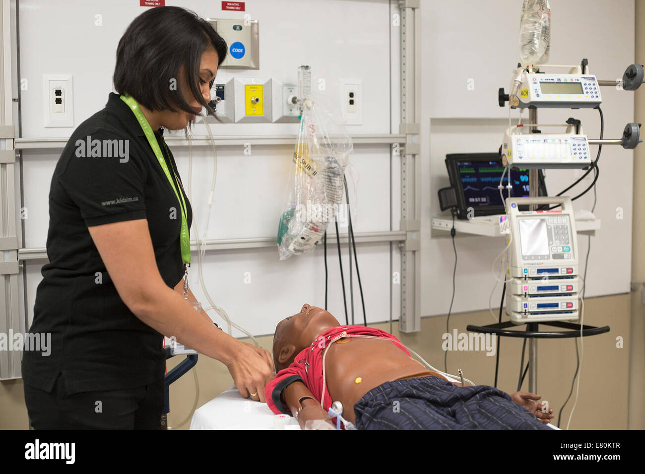 Calgary, Alberta, Canada, 27 Sep, 2014. Dr. Shirmee Doshi demonstrates ...