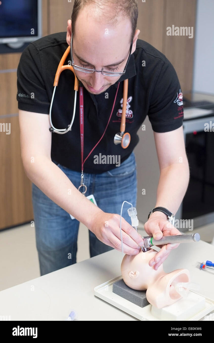 Calgary, Alberta, Canada, 27 Sep, 2014. Dr. Michael Assaad demonstrates ...