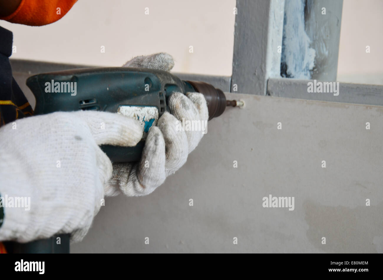 Man use drilling machine drill screw Stock Photo - Alamy