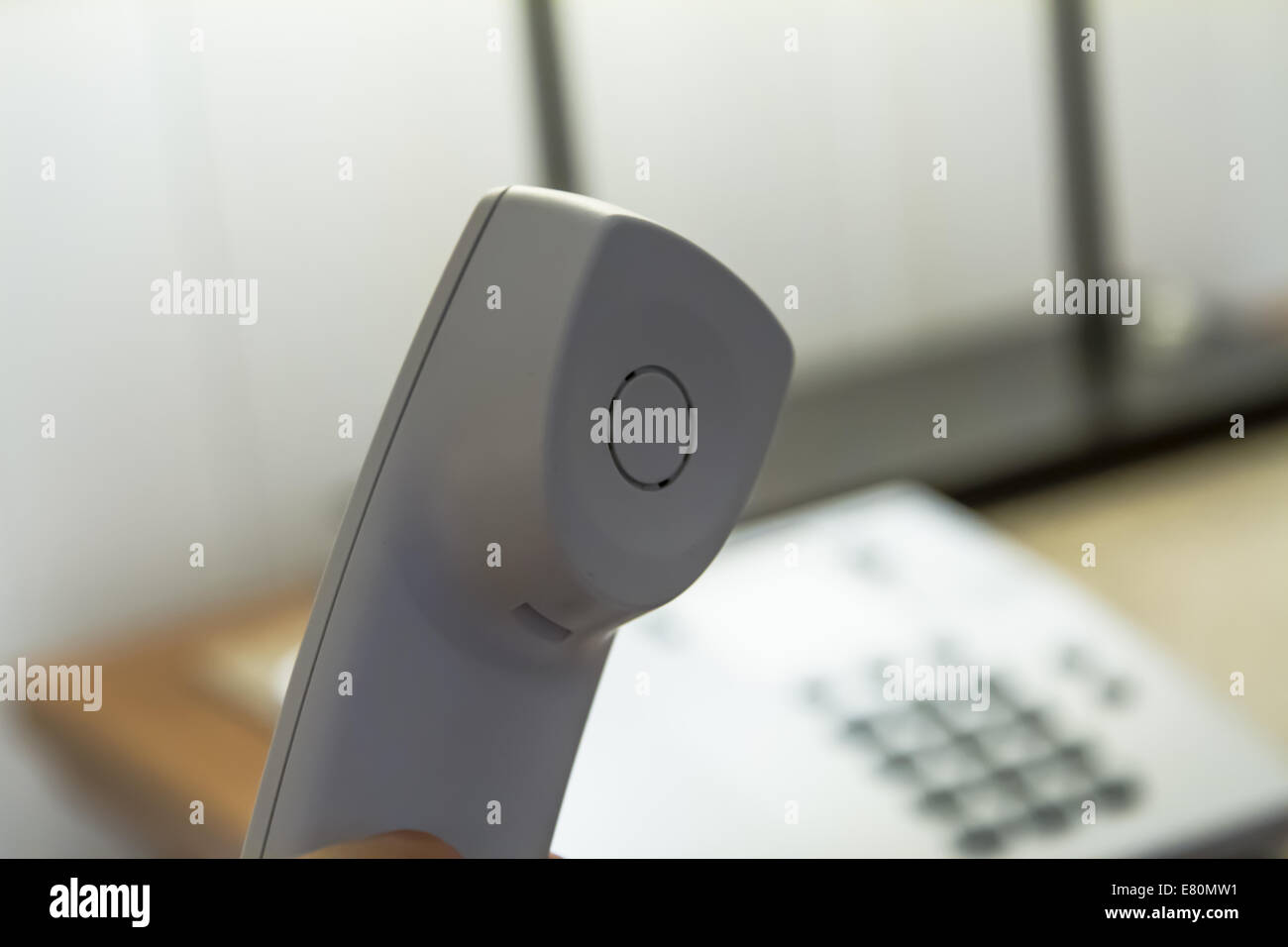 White telephone tube in hotel room Stock Photo - Alamy