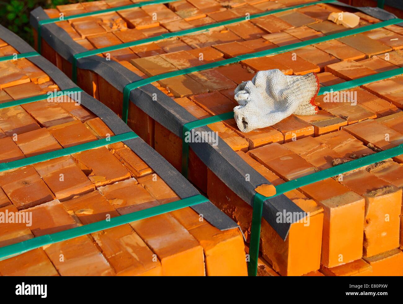 Pile of bricks at the construction site Stock Photo - Alamy
