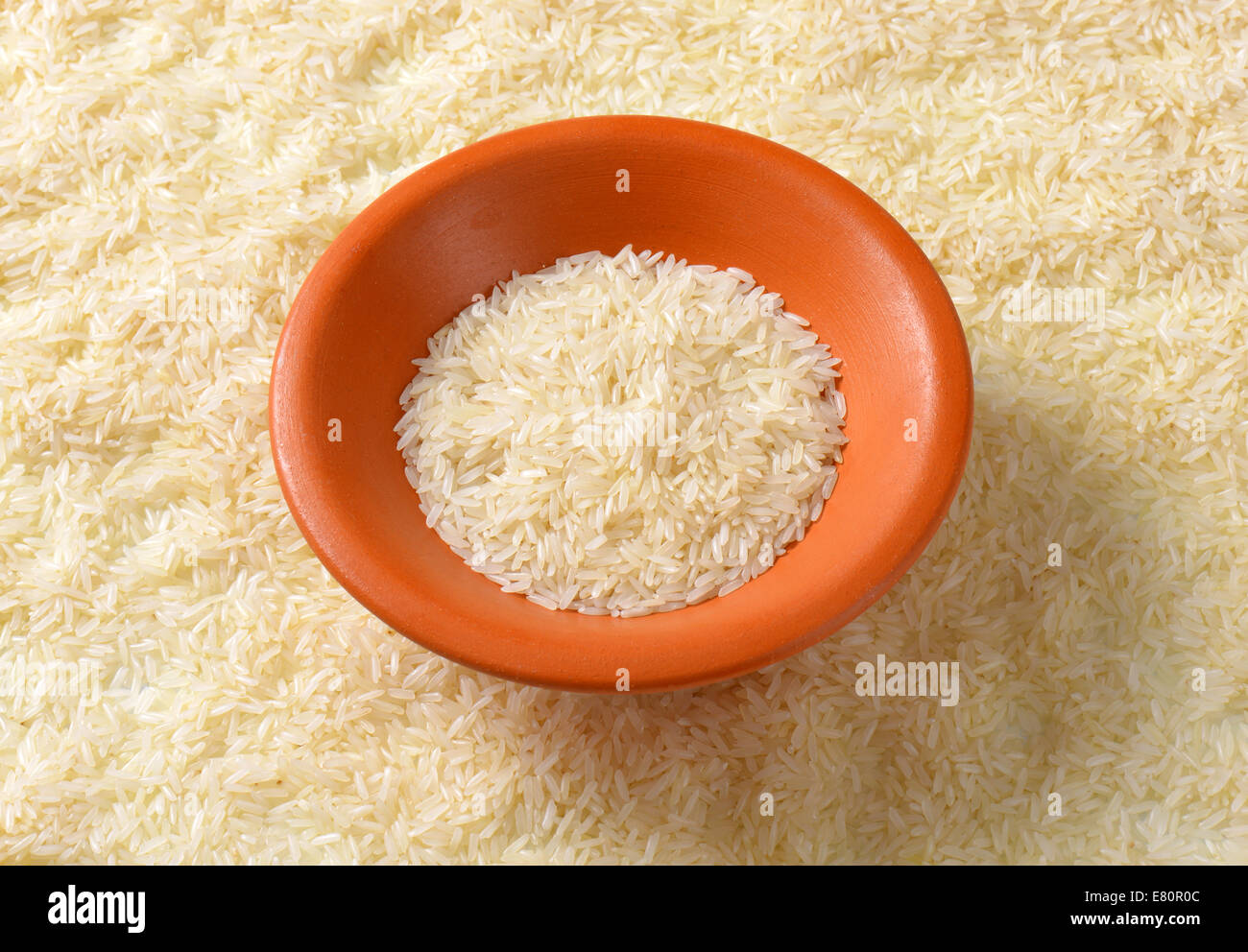 Bowl of uncooked Thai Jasmine rice Stock Photo - Alamy