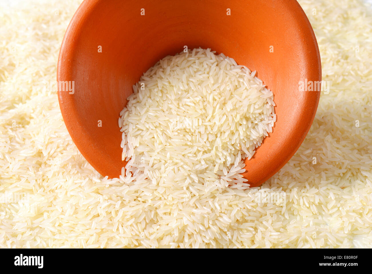 Bowl of uncooked Thai Jasmine rice Stock Photo - Alamy