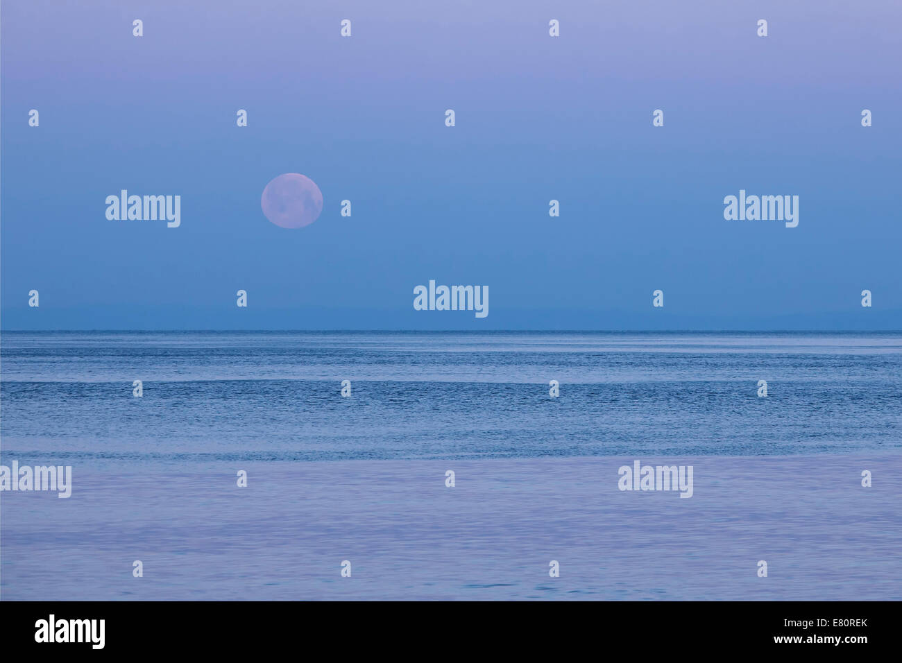 Moon over sea Stock Photo - Alamy