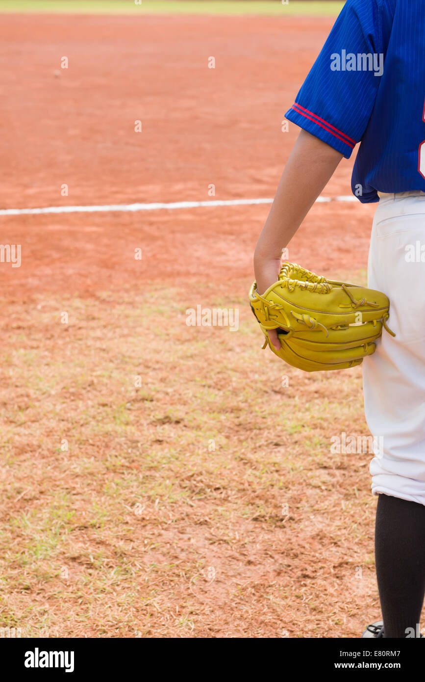 boy standing on a baseball field Stock Photo - Alamy
