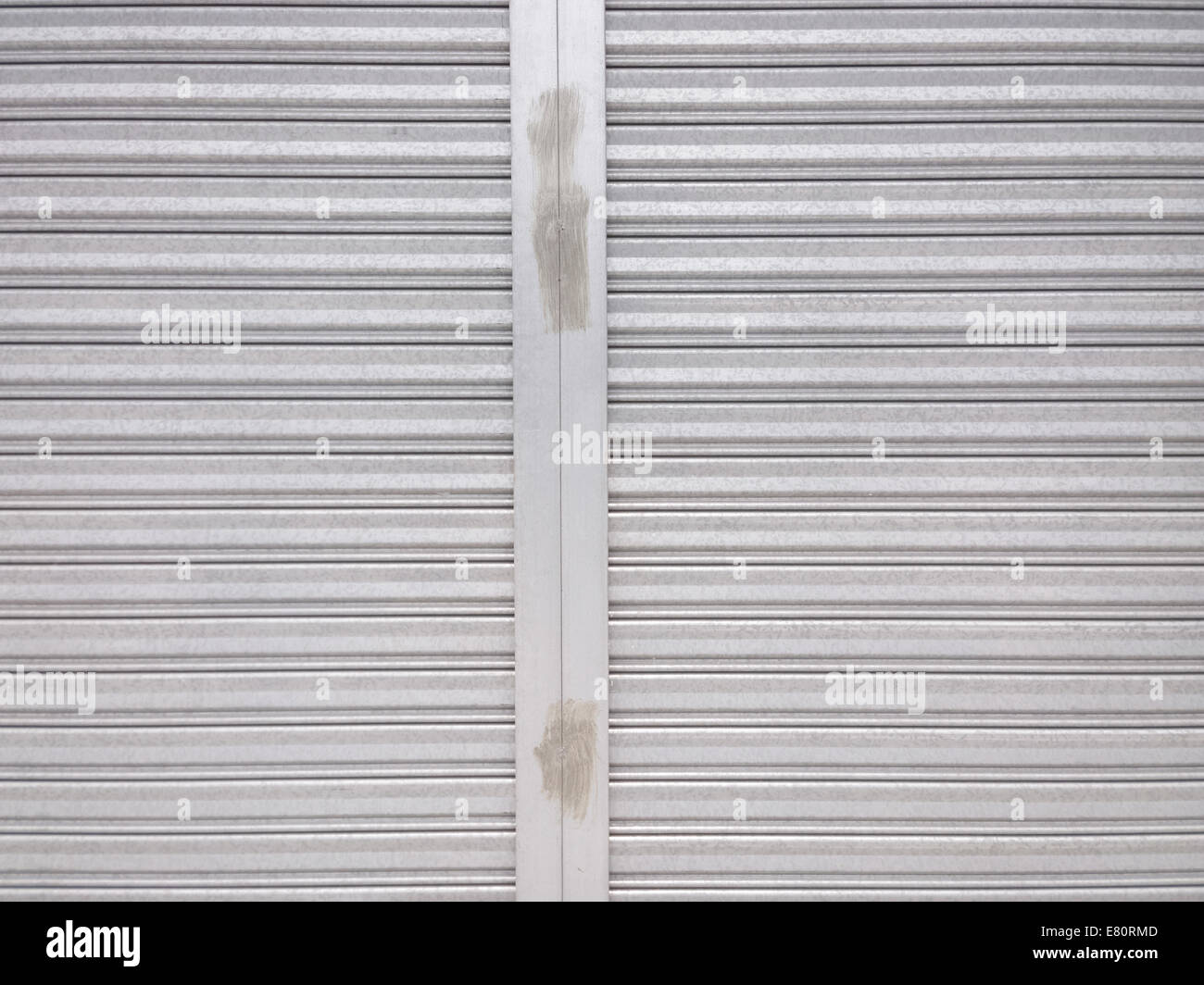 metal shutter door pattern with vertical frame in middle Stock Photo ...