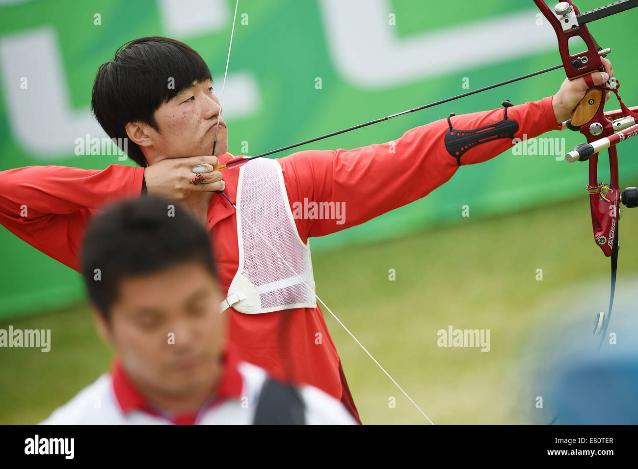 Incheon, South Korea. 28th Sep, 2014. Yong Zhiwei of China competes ...