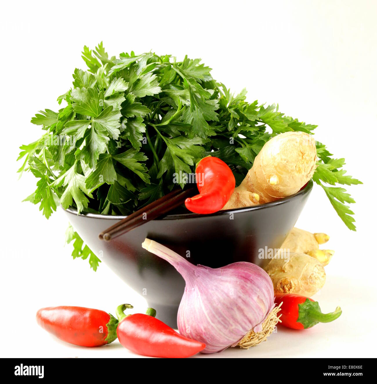 Asian food ingredients (ginger, chilli, coriander and garlic) in ...
