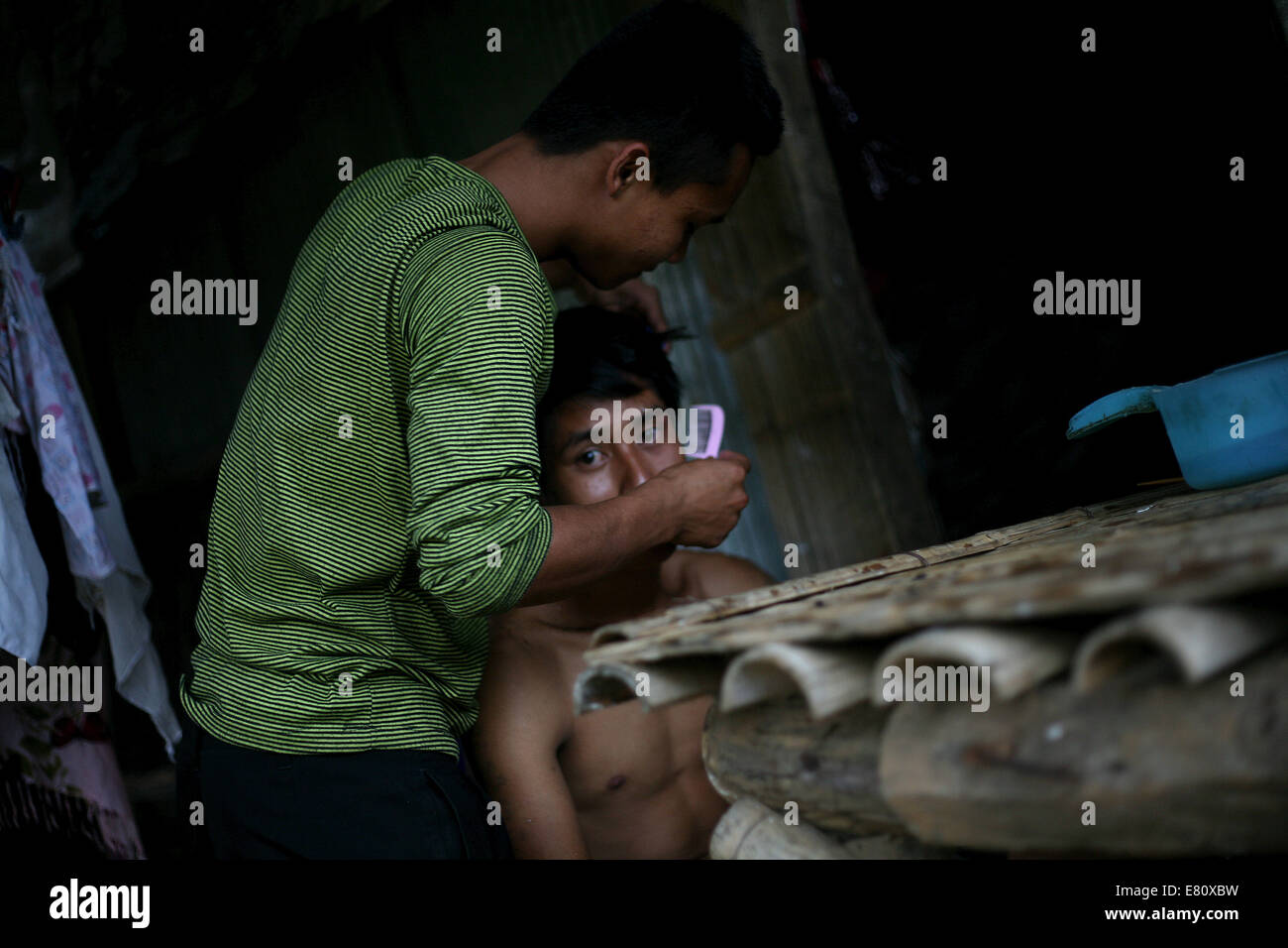 Umpiem, Umphang, Thailand. 1st Jan, 2000. A burmese refugee getting a ...