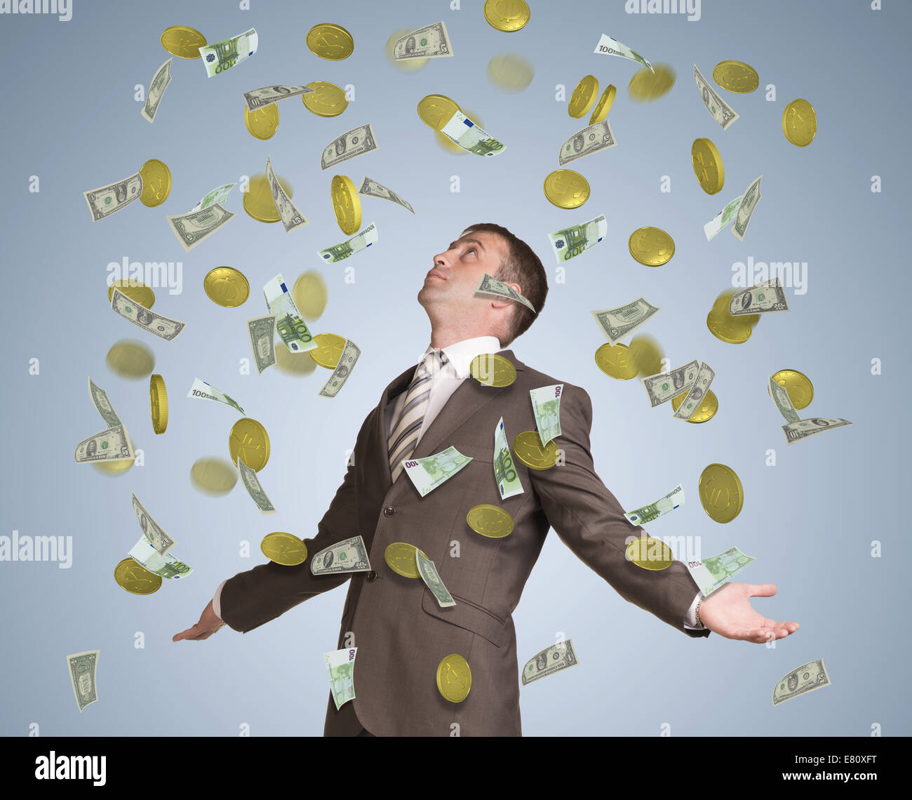 Businessman spread his arms. Money fall from above Stock Photo - Alamy