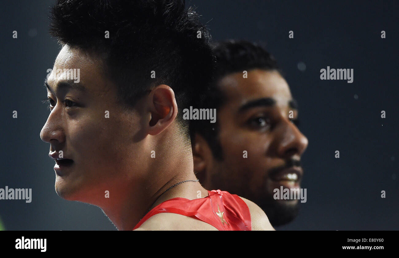 Incheon, South Korea. 28th Sep, 2014. Jiang Fan (L) of China reacts ...