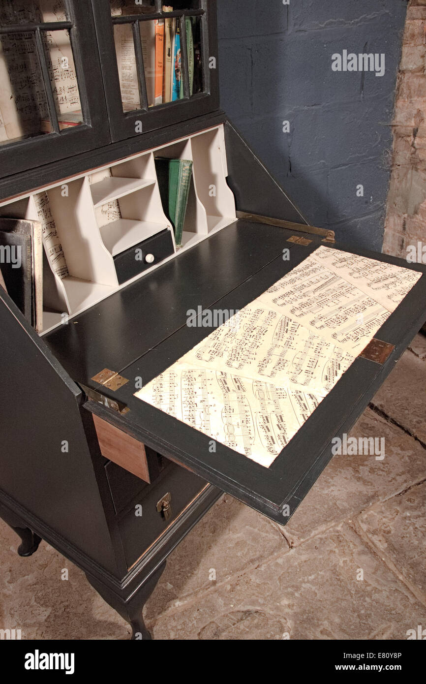 Black decoupaged vintage sheet music shabby chic bureau Stock Photo - Alamy